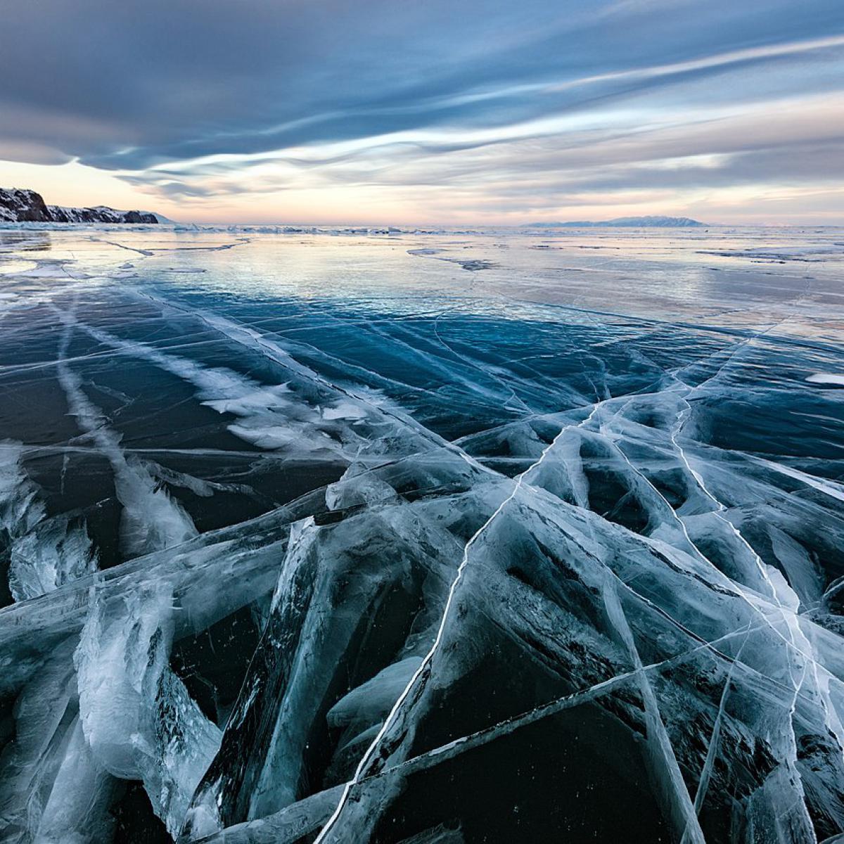 Perfect circles of ice seen rotating on water surface of Russian rivers ...
